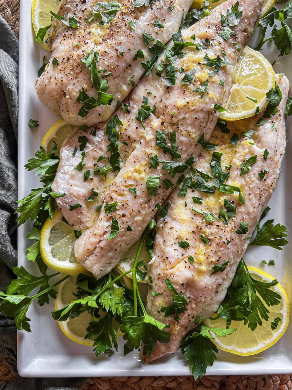 Baked Walleye with Lemon Garlic Butter and Herbs - Big Delicious Life
